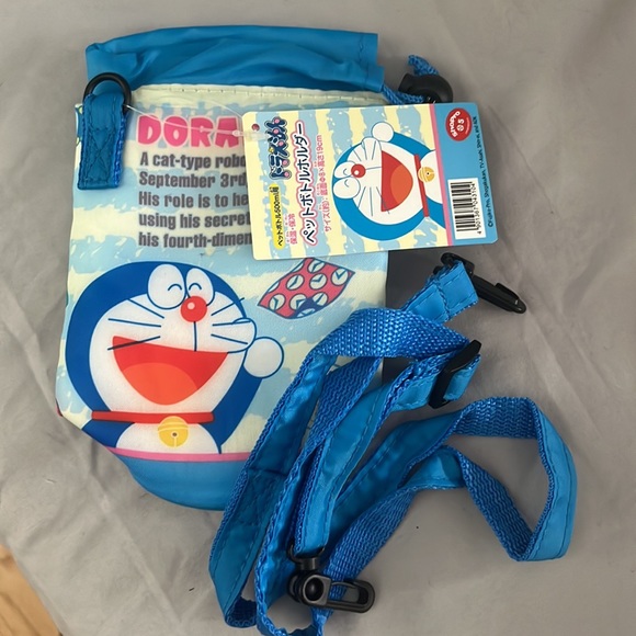 Sanrio | Accessories | Doraemon Water Bottle Sleeve With Strap | Poshmark